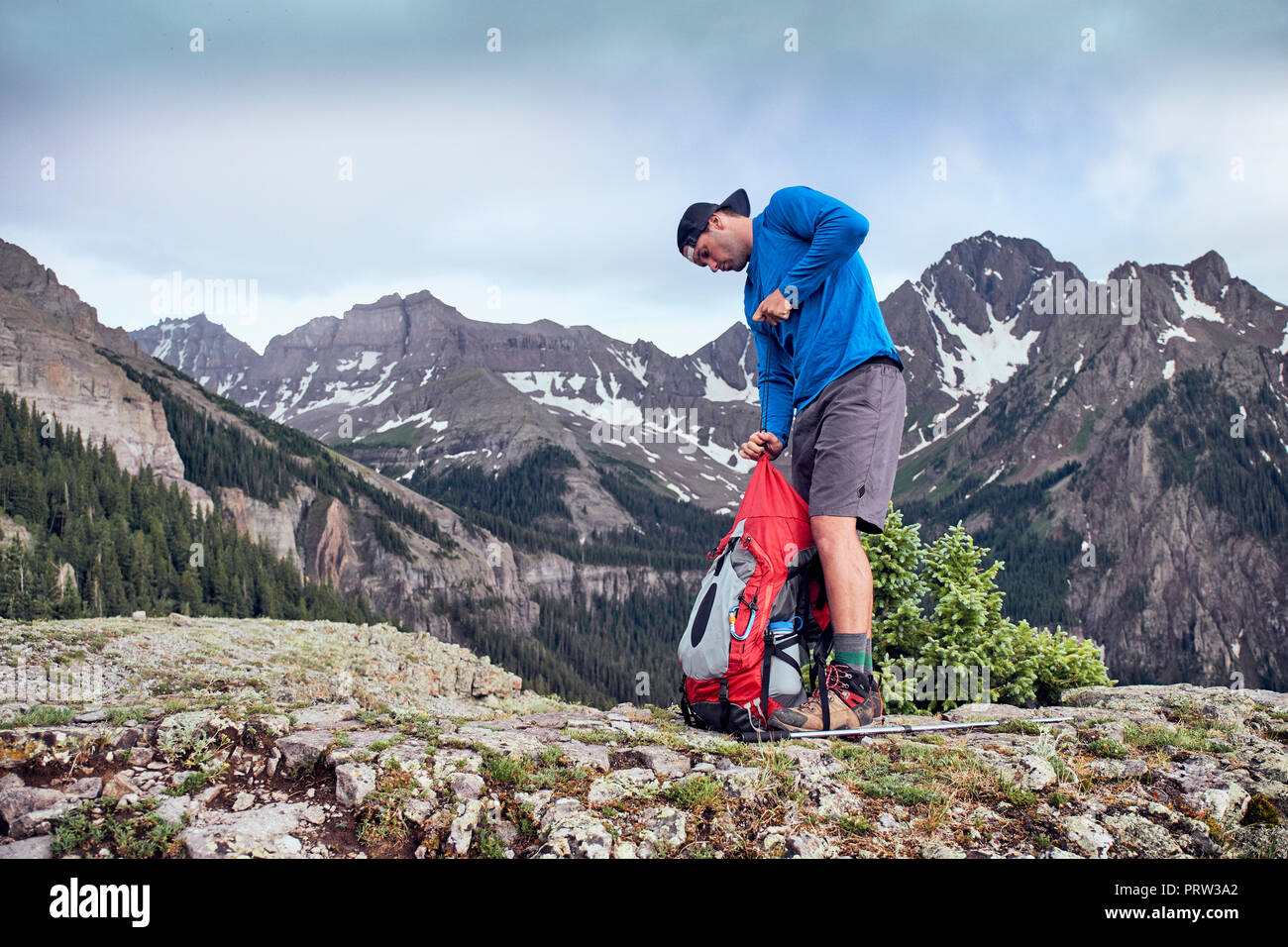 Hiker taking break, Mount Sneffels, Ouray, Colorado, USA Stock Photo ...