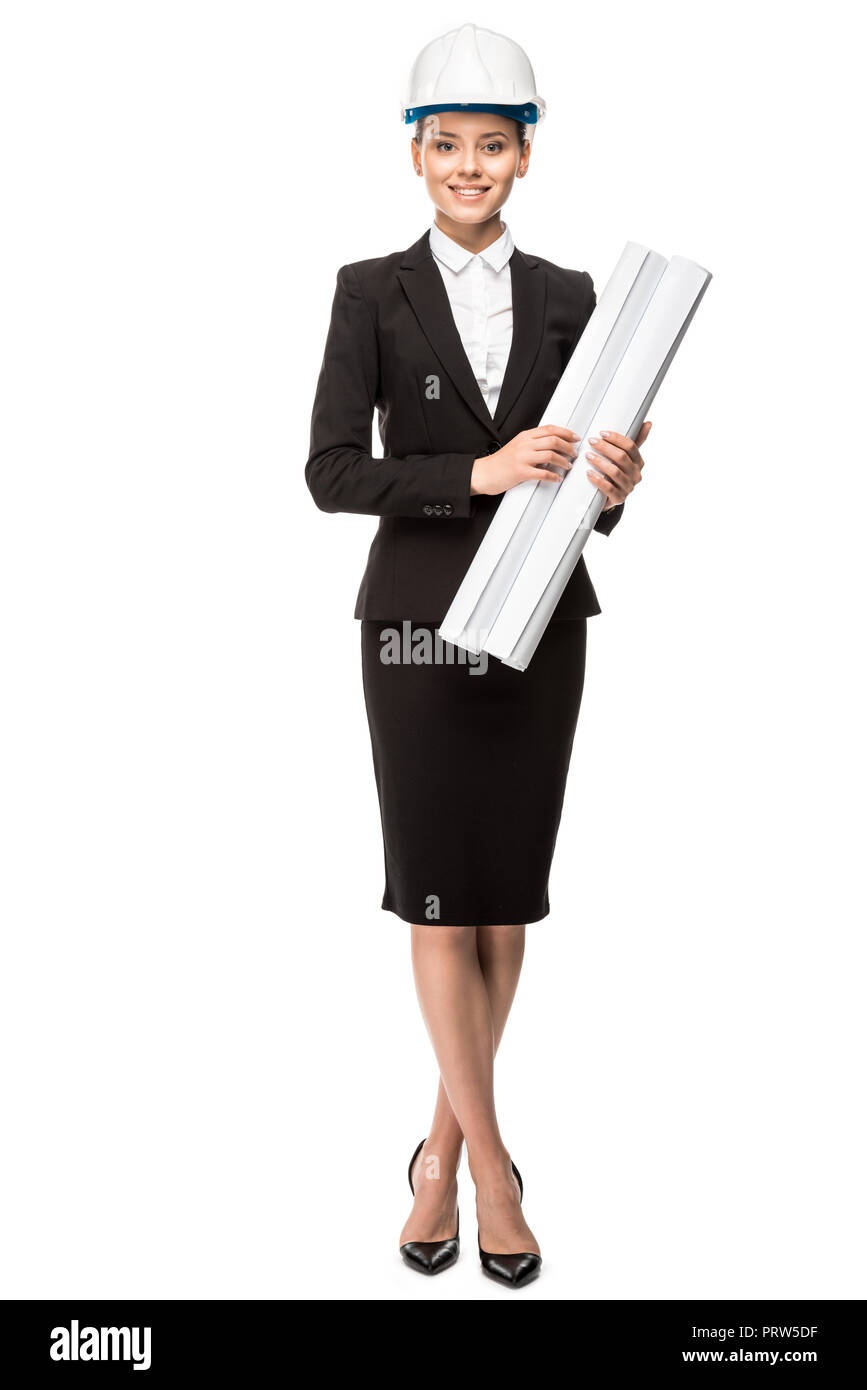 attractive young female architect in helmet and suit holding blueprints ...