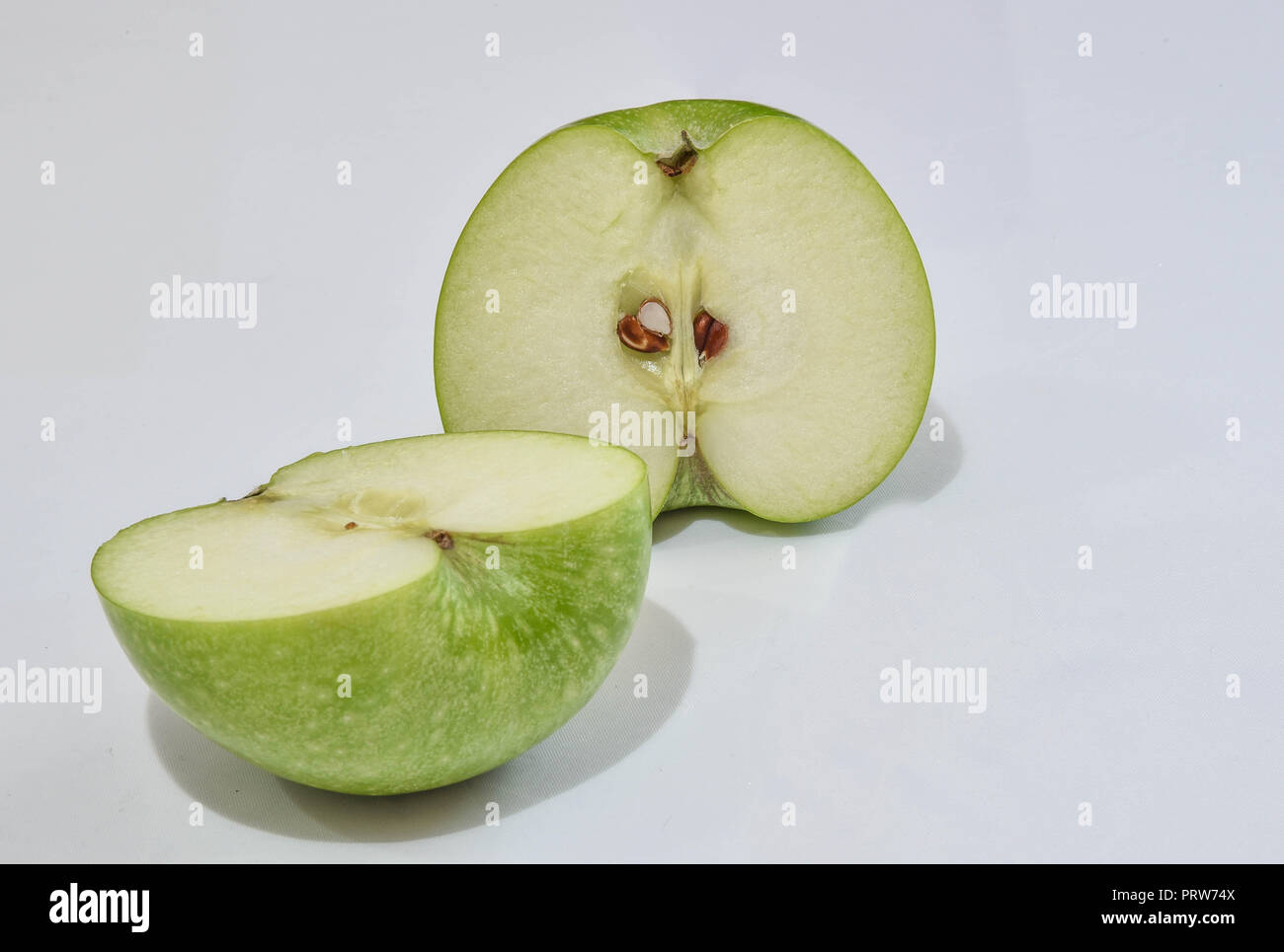 sliced apple on white background Stock Photo - Alamy