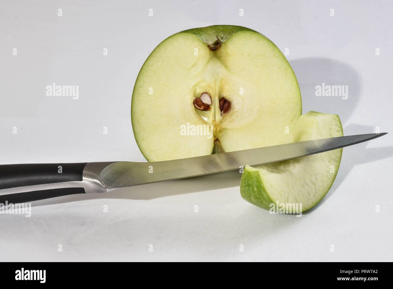 sliced apple on white background Stock Photo - Alamy