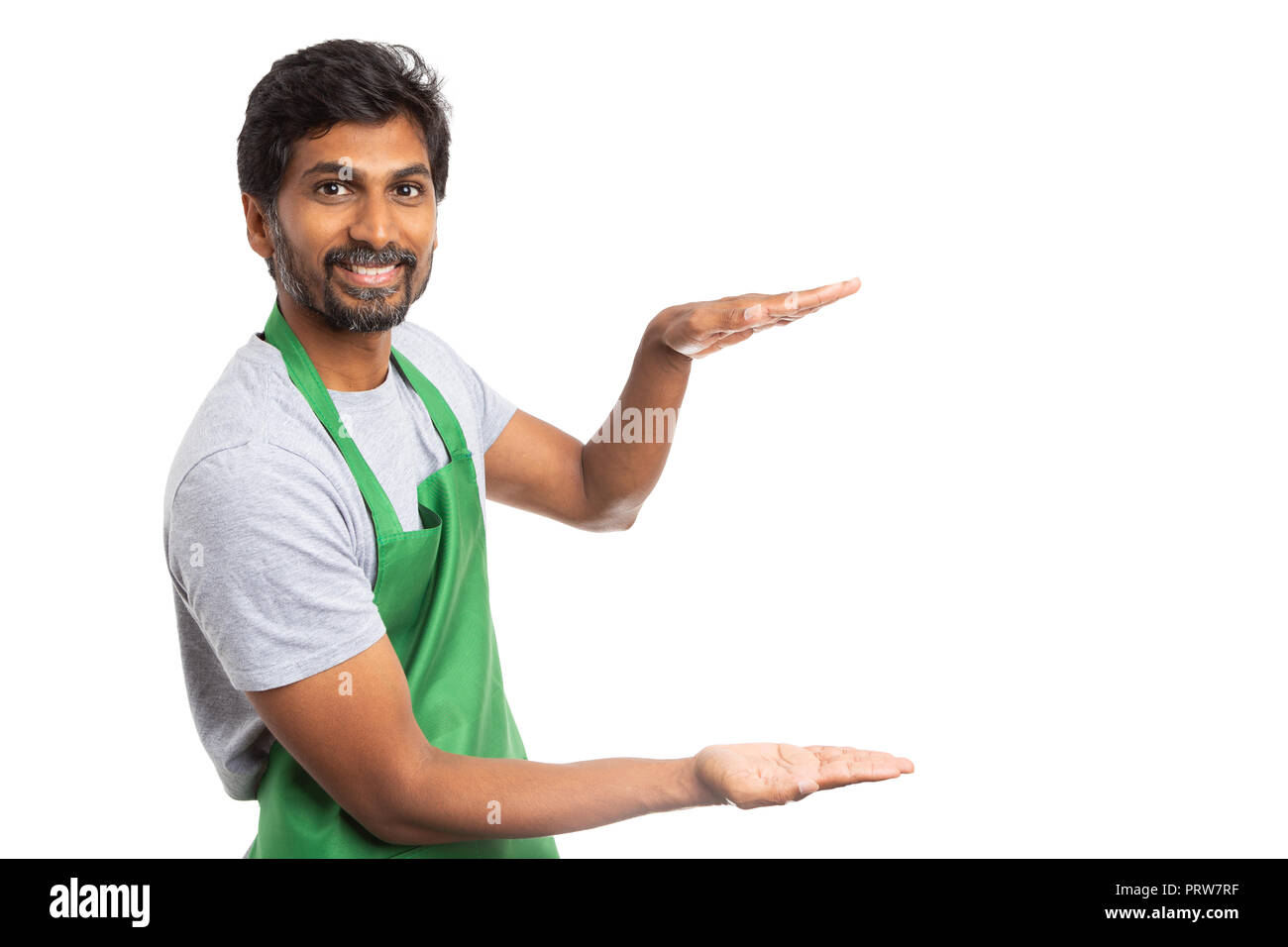 Storekeeper or hypermarket male employee showing copyspace for large ...