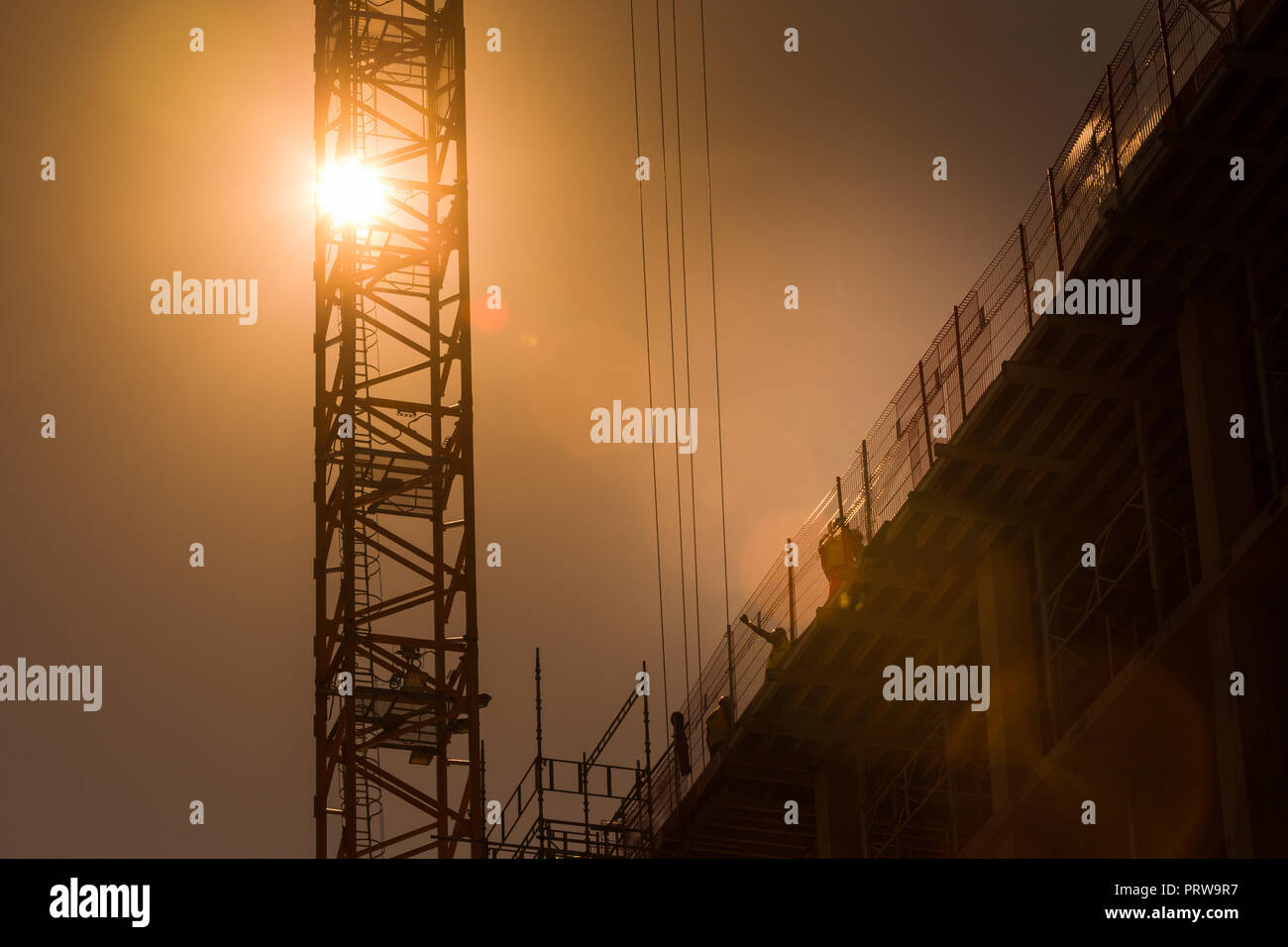 Construction site UK 2018 with a crane in sunshine Stock Photo - Alamy