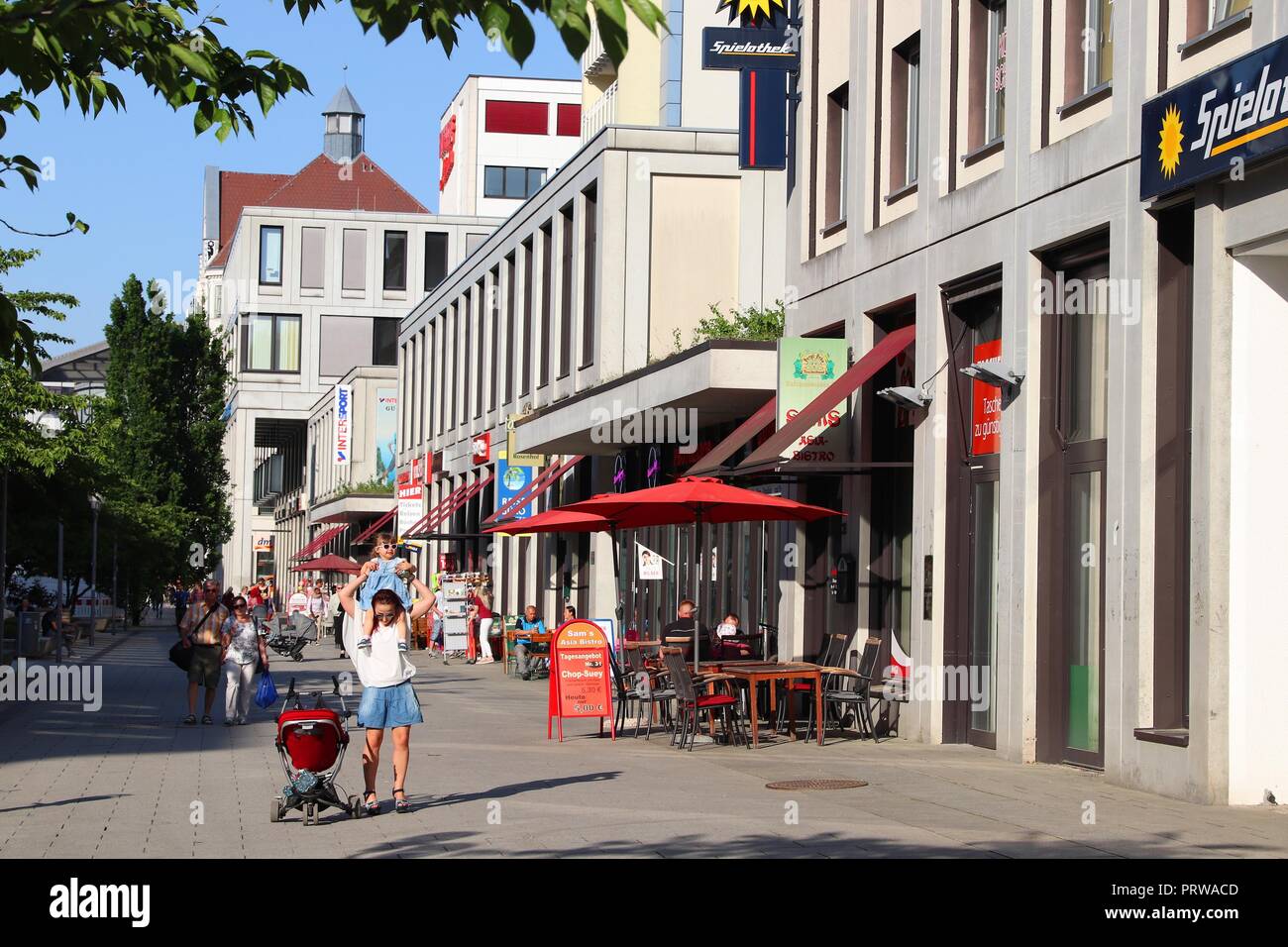 CHEMNITZ, GERMANY - MAY 8, 2018: People visit a shopping area in ...