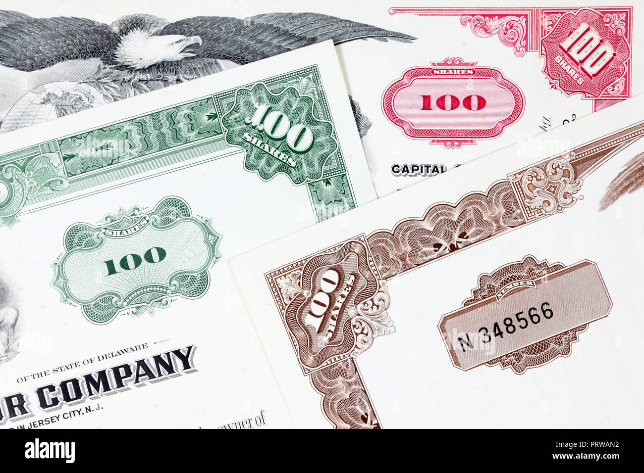 Corporate investing. Old stock share certificates from 1950s-1970s ...