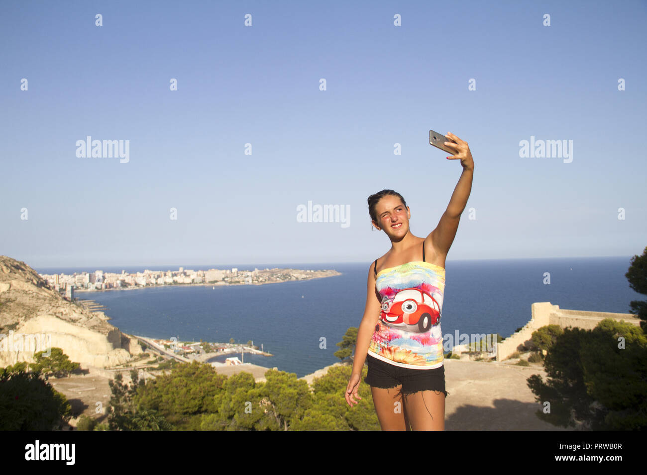 girl making selfie in alicante spain Stock Photo - Alamy