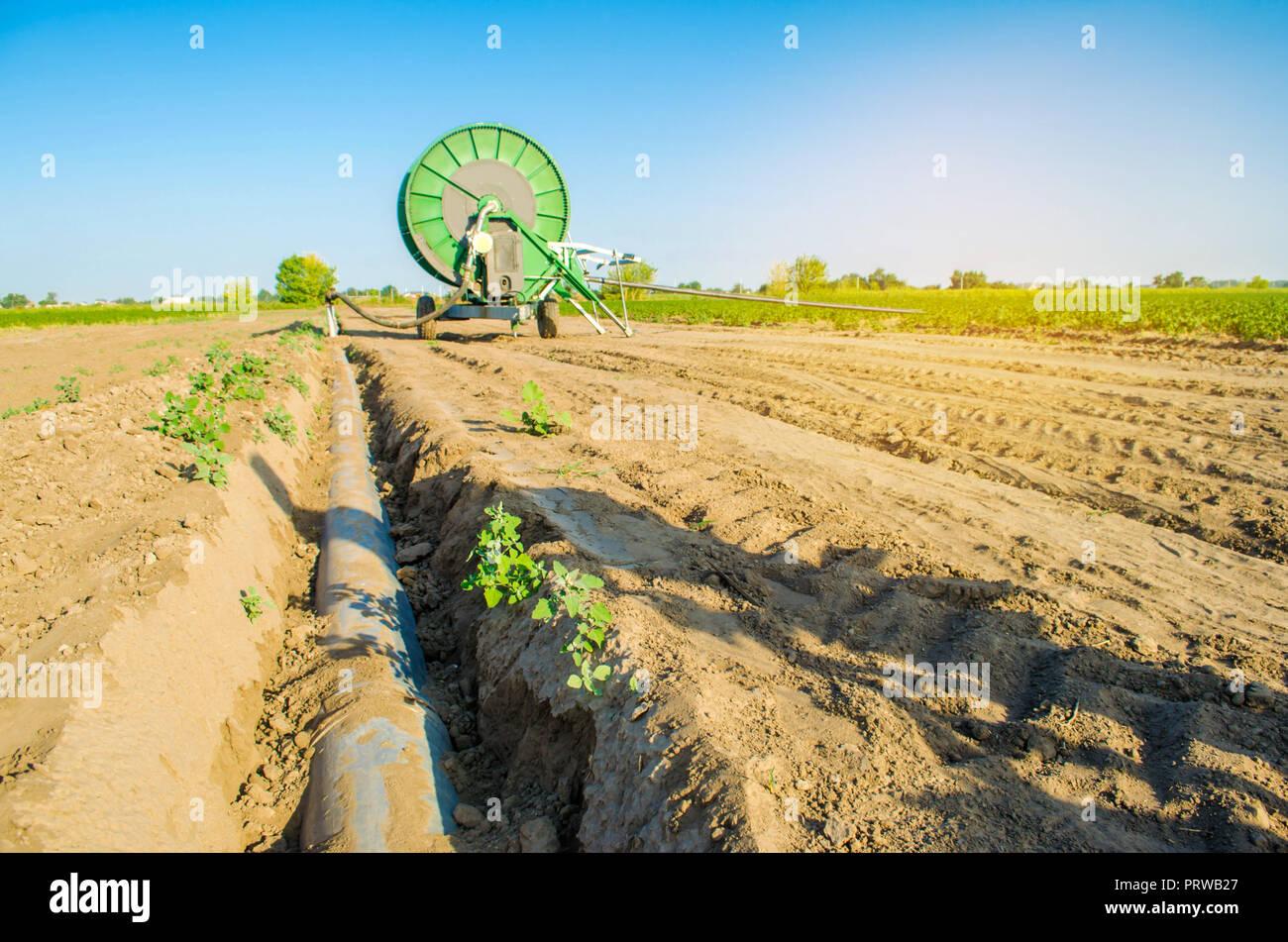 Irrigation system for watering of agricultural crops with a big hose ...
