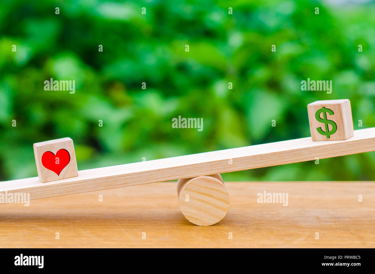 Money versus love concept. Passion versus profit. Family or career ...