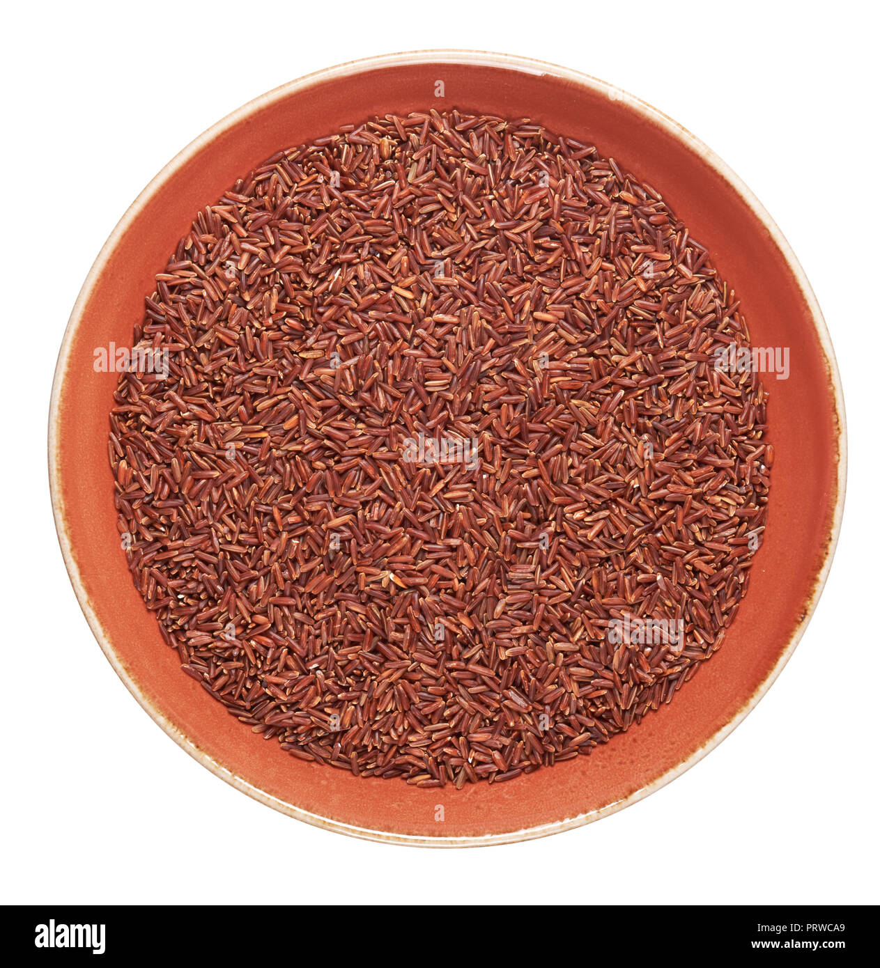 Top view of red rice isolated on white background with clipping path ...