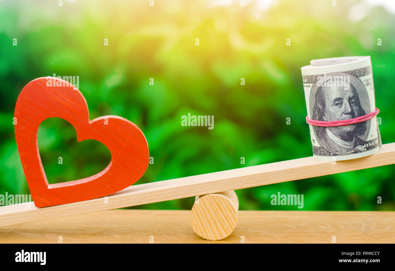 Money versus love concept. Passion versus profit. Family or career ...