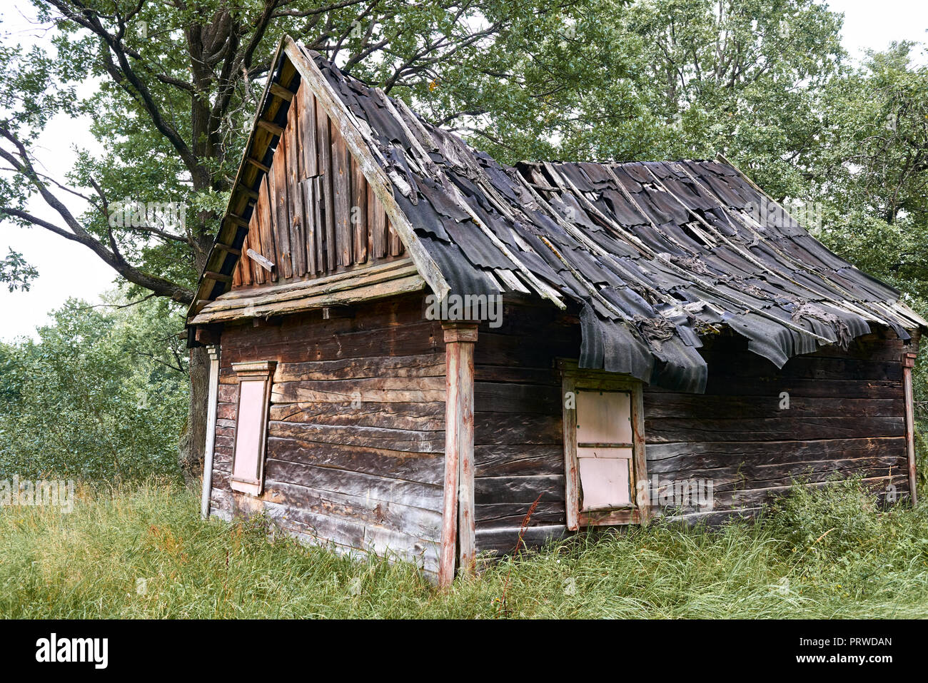 old wooden house in the forest Stock Photo - Alamy