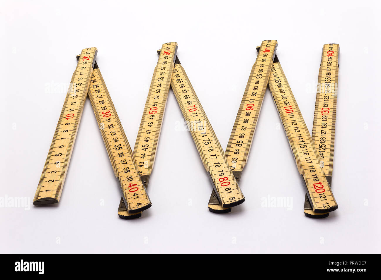 Wooden folding ruler isolated on a white background with a clipping ...