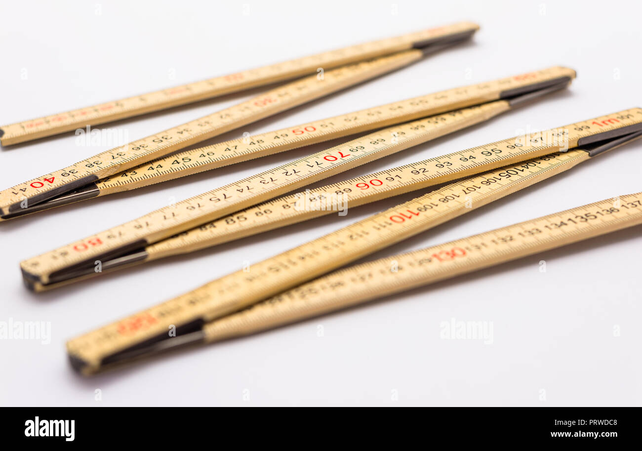 Wooden folding ruler isolated on a white background Stock Photo - Alamy