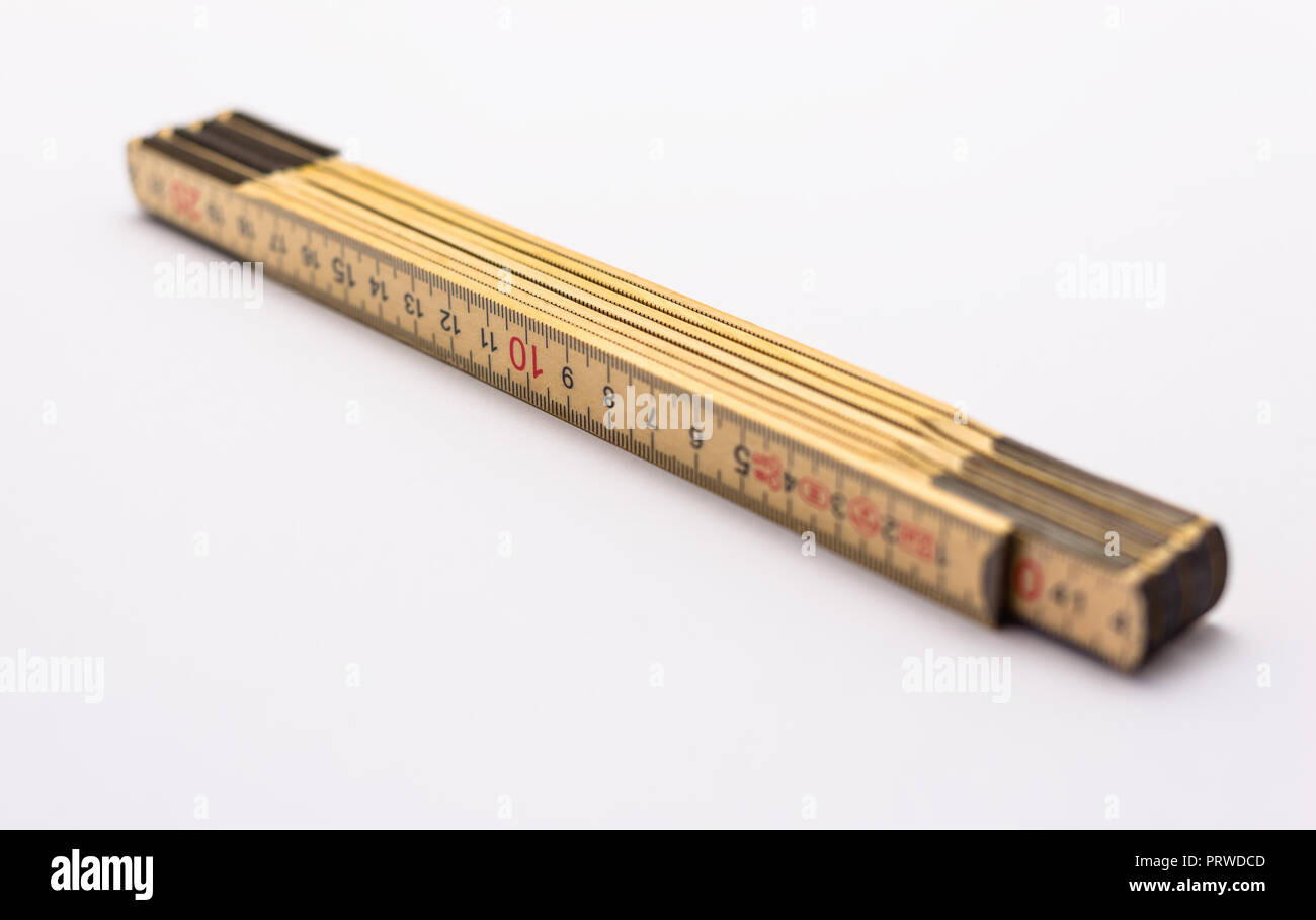 Wooden folding ruler isolated on a white background Stock Photo - Alamy