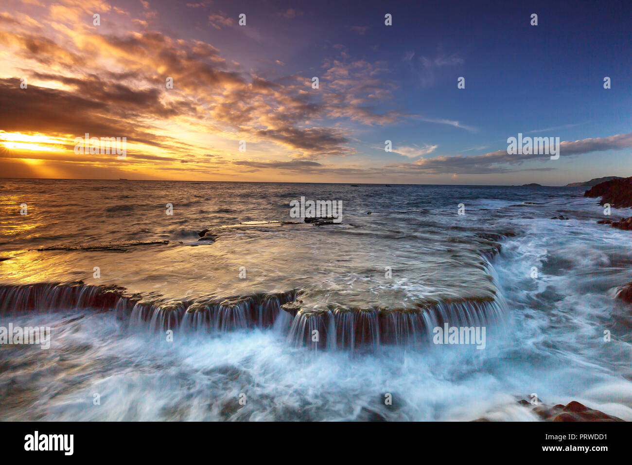 Waterfalls in the middle of the ocean. At the Hang Rai in the Chua ...