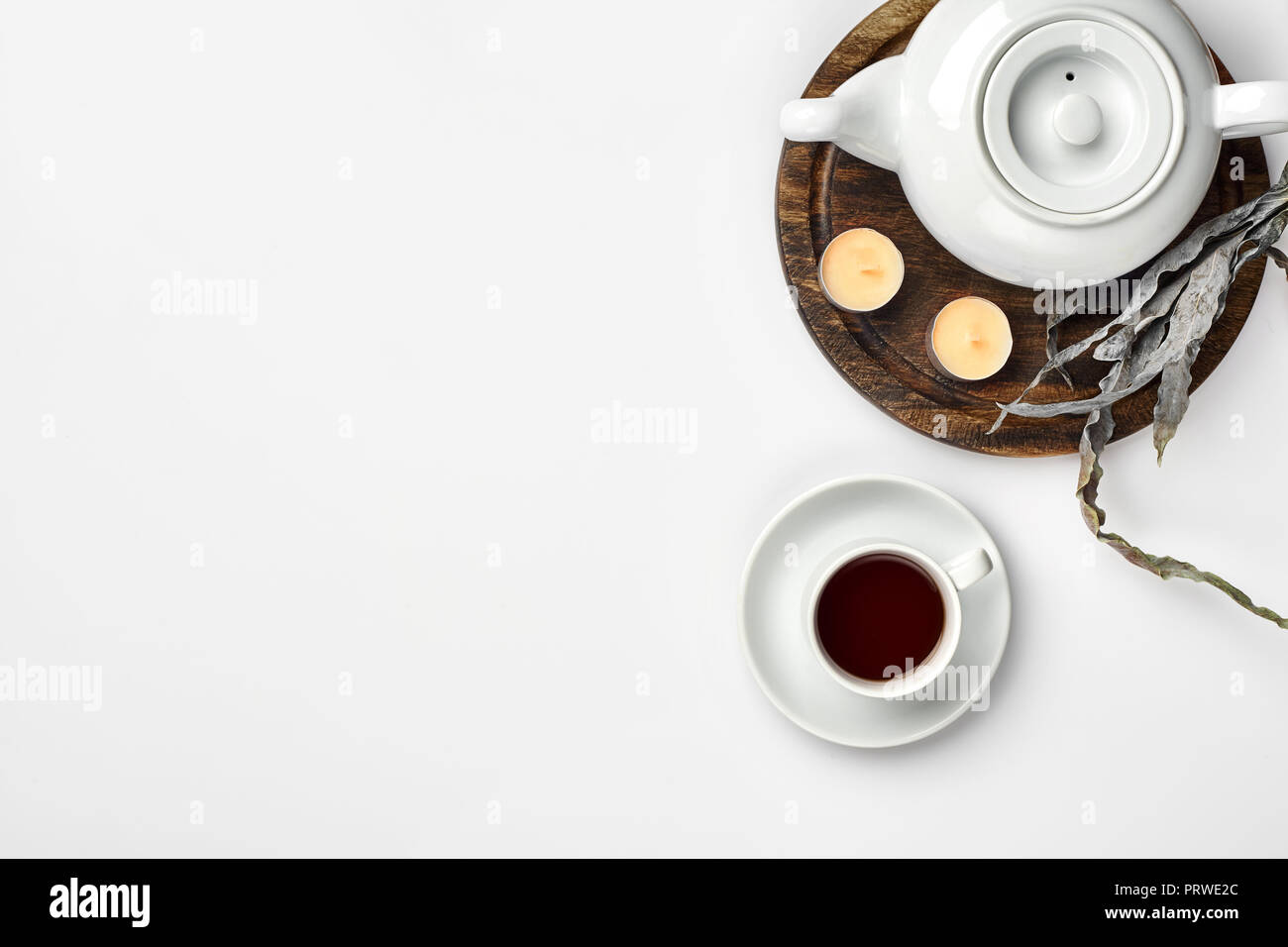 Top view of the tea pot and tea cup on white background Stock Photo - Alamy