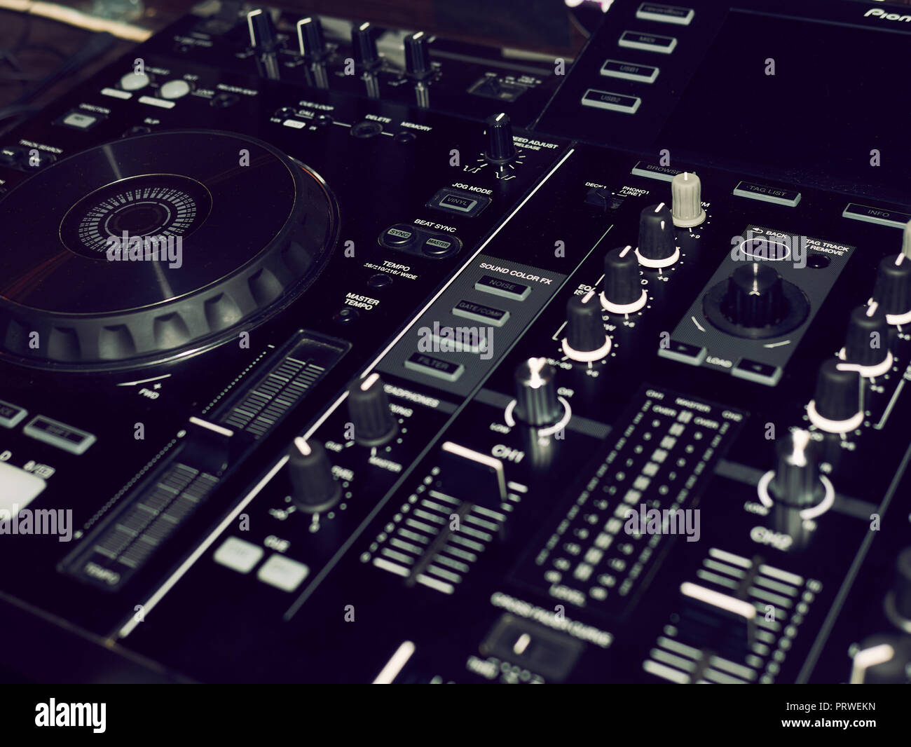 Sound mixing console detail, close up. DJ professional music console ...