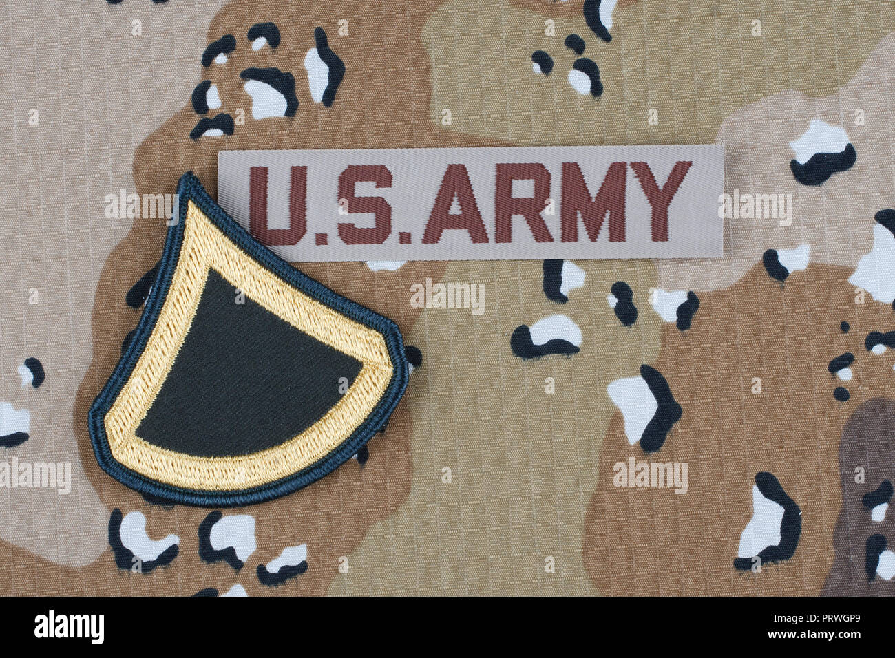 US ARMY desert uniform with rank patch Stock Photo - Alamy