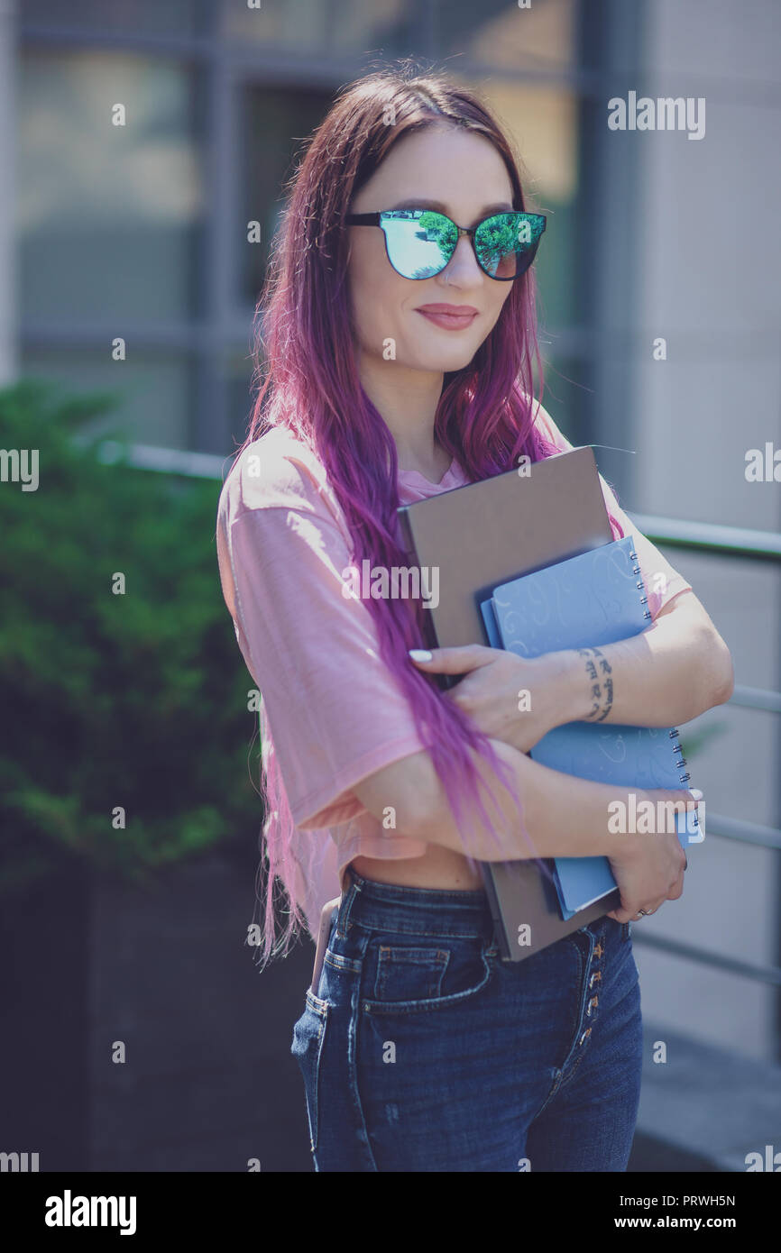 Portrait beautiful female writer dressed in casual outfit holdin Stock ...