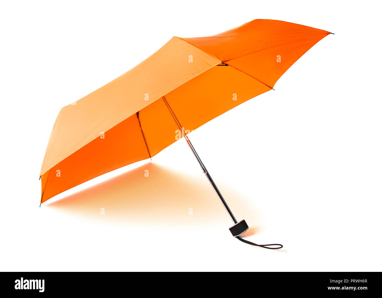 single orange umbrella isolated on white background Stock Photo - Alamy