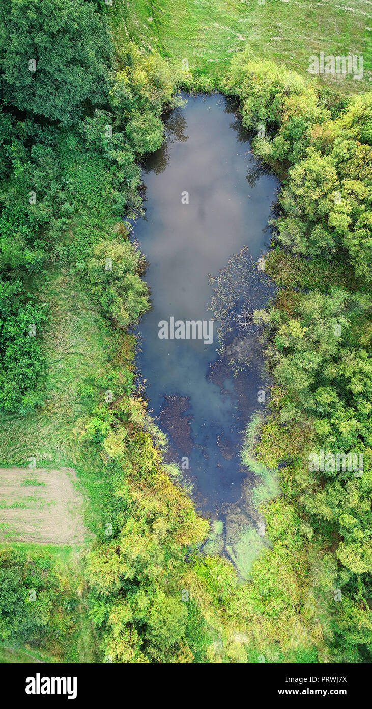 Small pond from the drone Stock Photo - Alamy