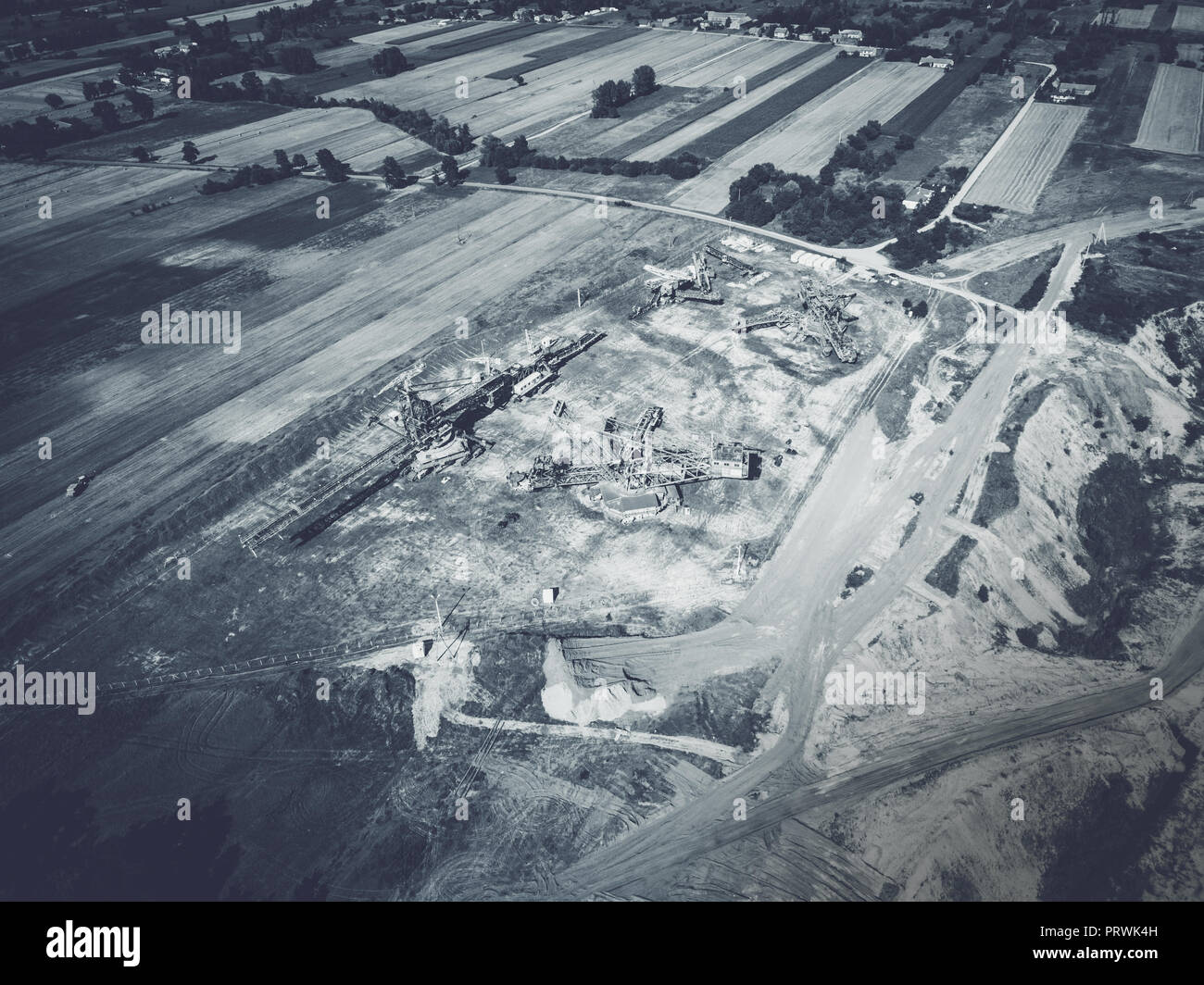 Aerial view of open pit excavator and other machinery Stock Photo - Alamy