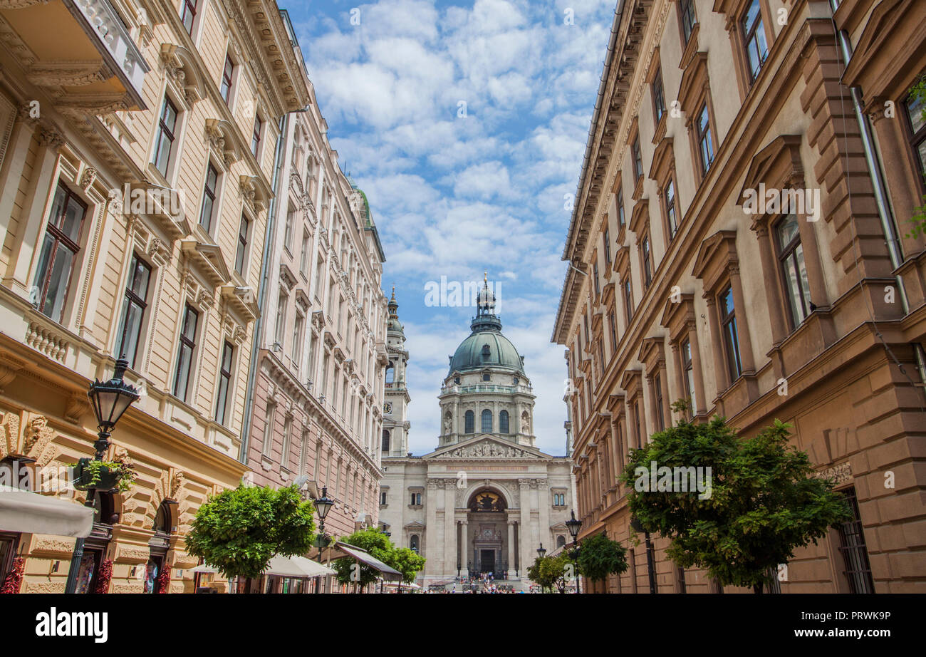 Old town street buildings and the St. Stephen's Basilica, a Roman ...