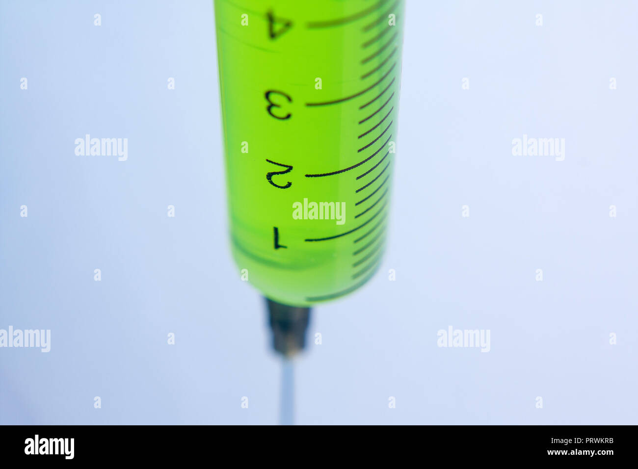 Syringe green liquid hi-res stock photography and images - Alamy
