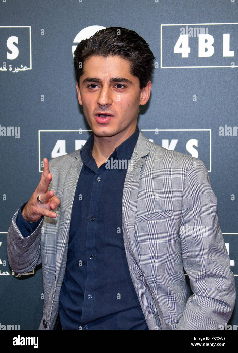 04 October 2018, Berlin: Actor Rauand Tales is on the red carpet for ...