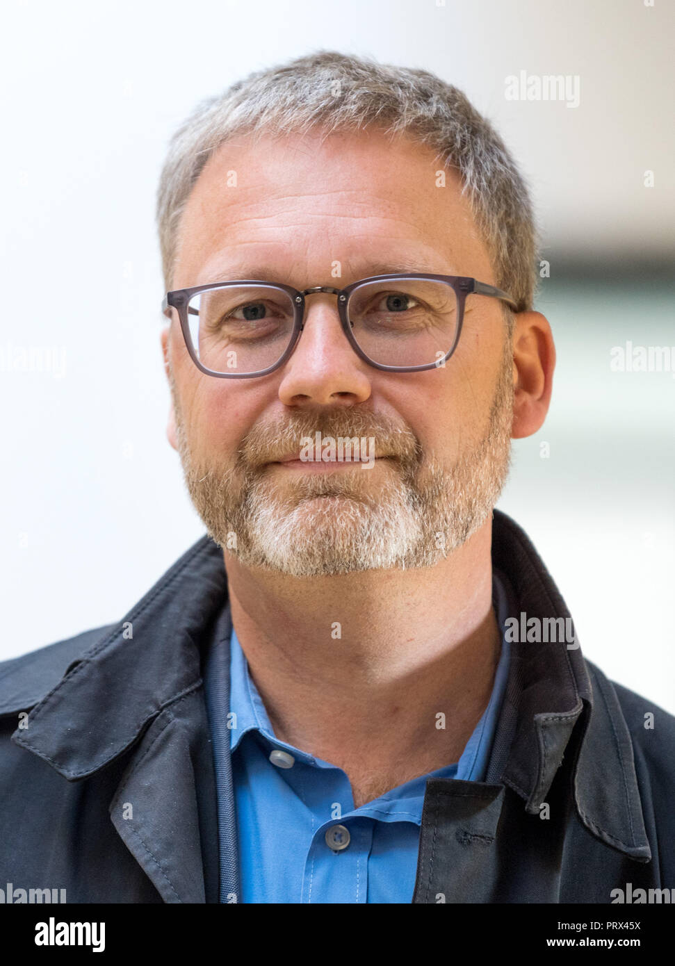 Chemnitz, Saxony. 05th Oct, 2018. Historian Peter Wellach stands in the ...