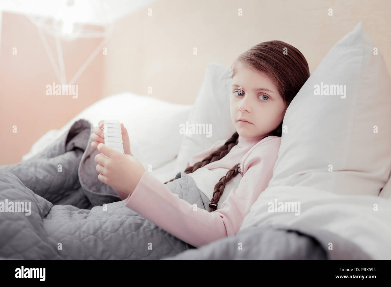 Sick girl in bed hi-res stock photography and images - Alamy
