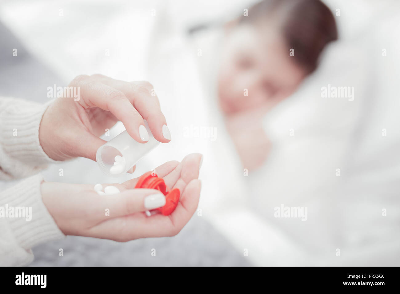 Close up of medicine being spilled out in a palm Stock Photo - Alamy
