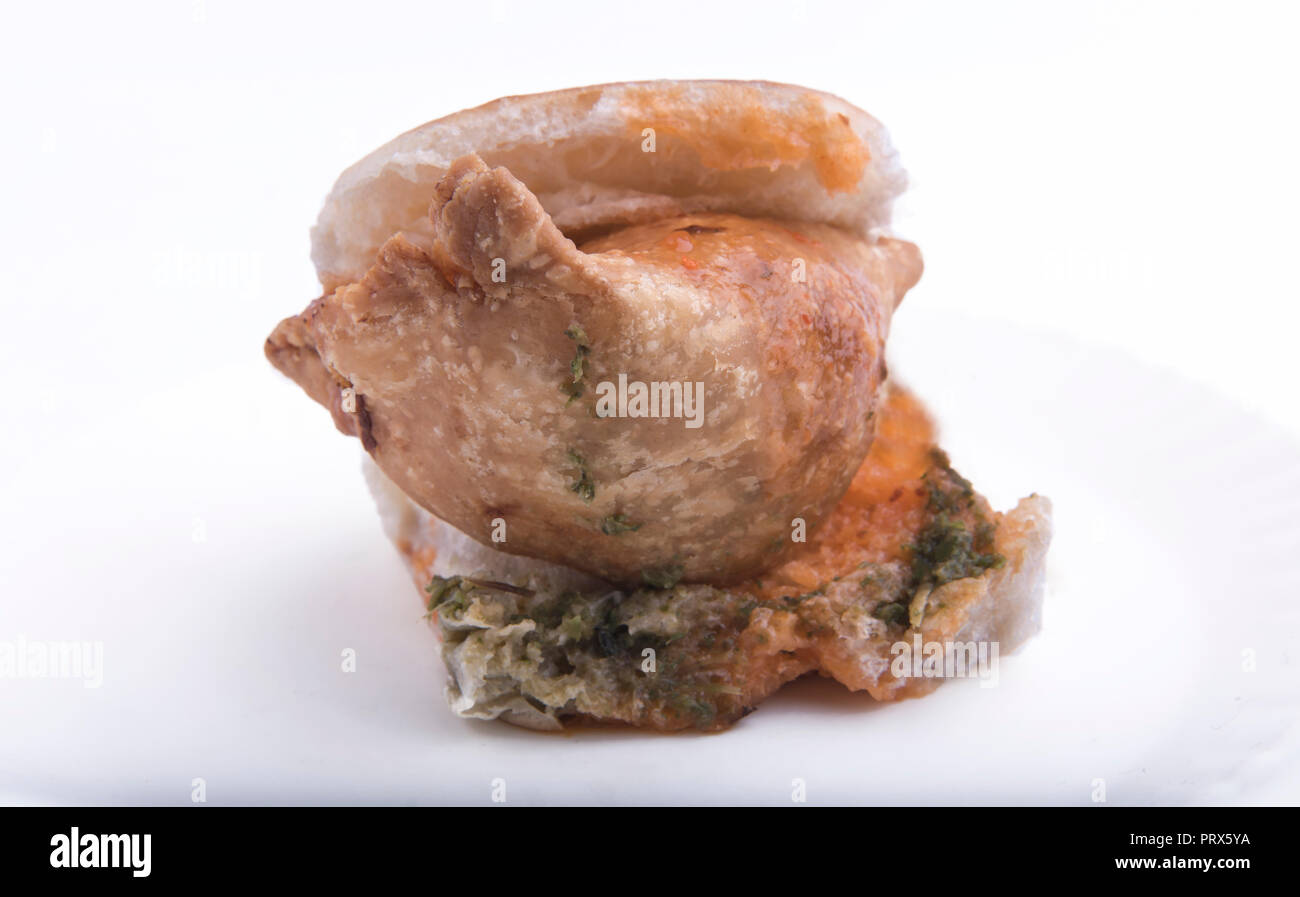 Indian local snack food Samosa Pav isolated on a white background ...