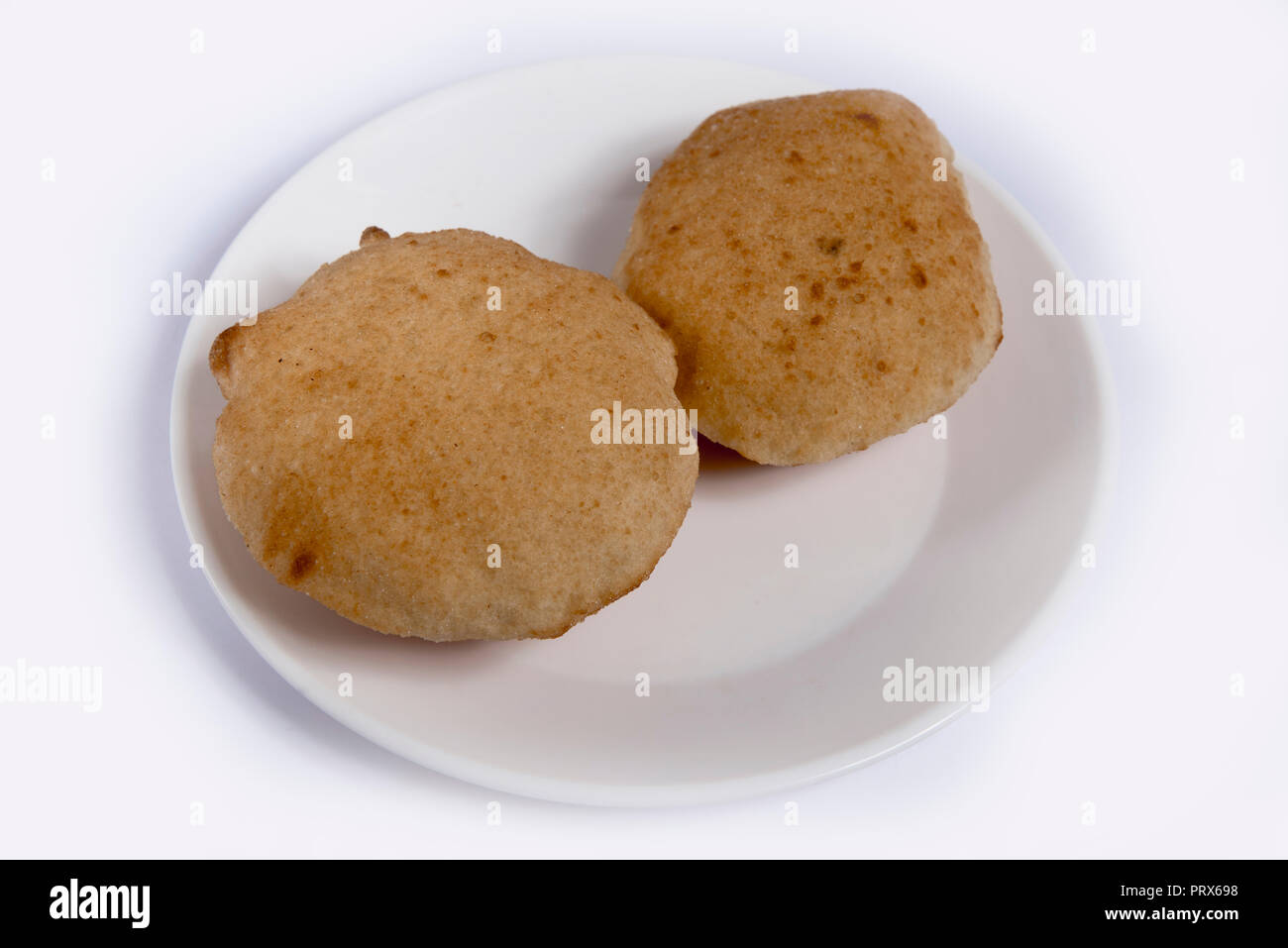 Poori or puri are the deep fried Indian breads usually made for the ...