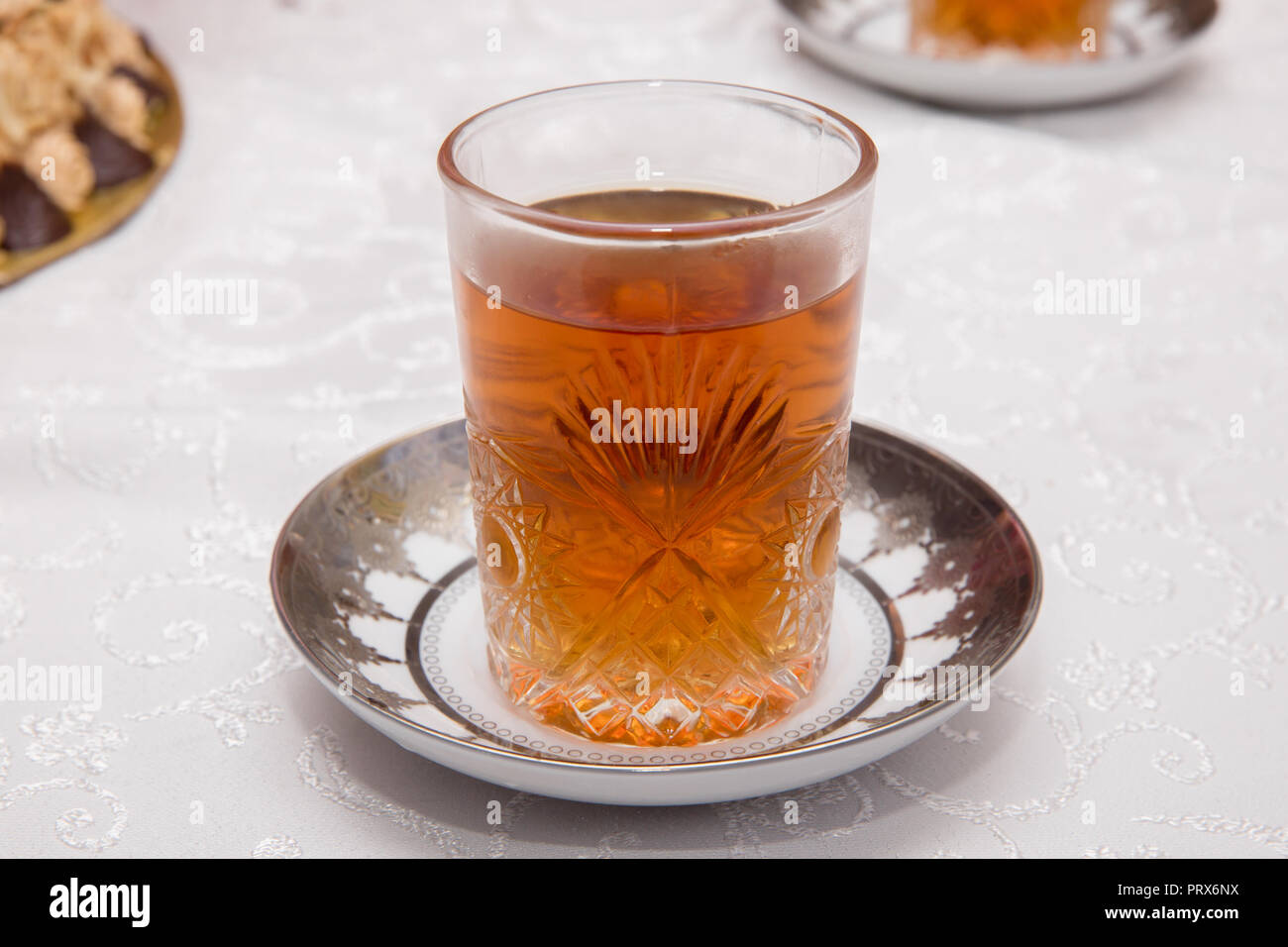 Azerbaijan tea in traditional glass on tray closeup Stock Photo - Alamy