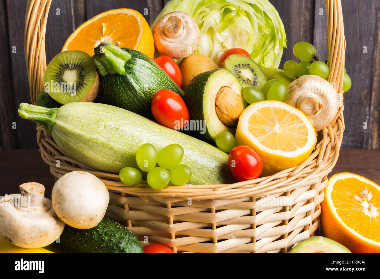 Colorful fresh natural organic vegetables and fruits in the basket ...