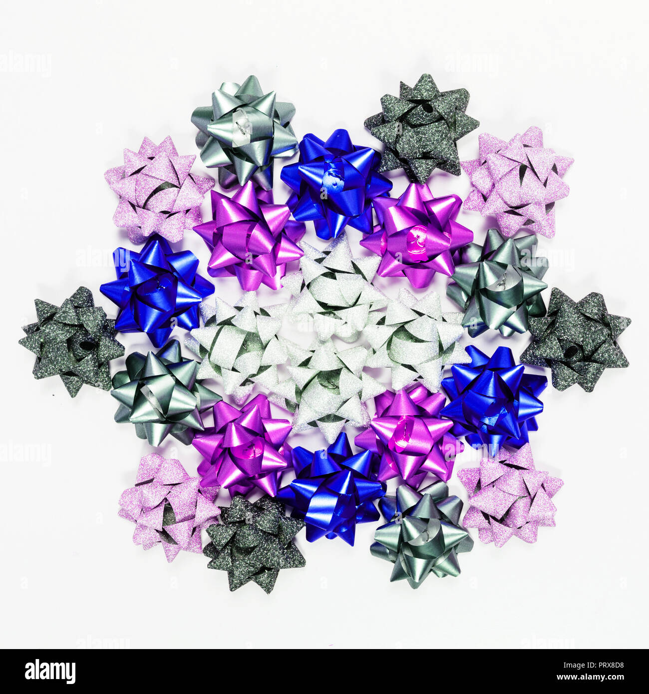 Colored bows on white background, top view, square shot Stock Photo - Alamy