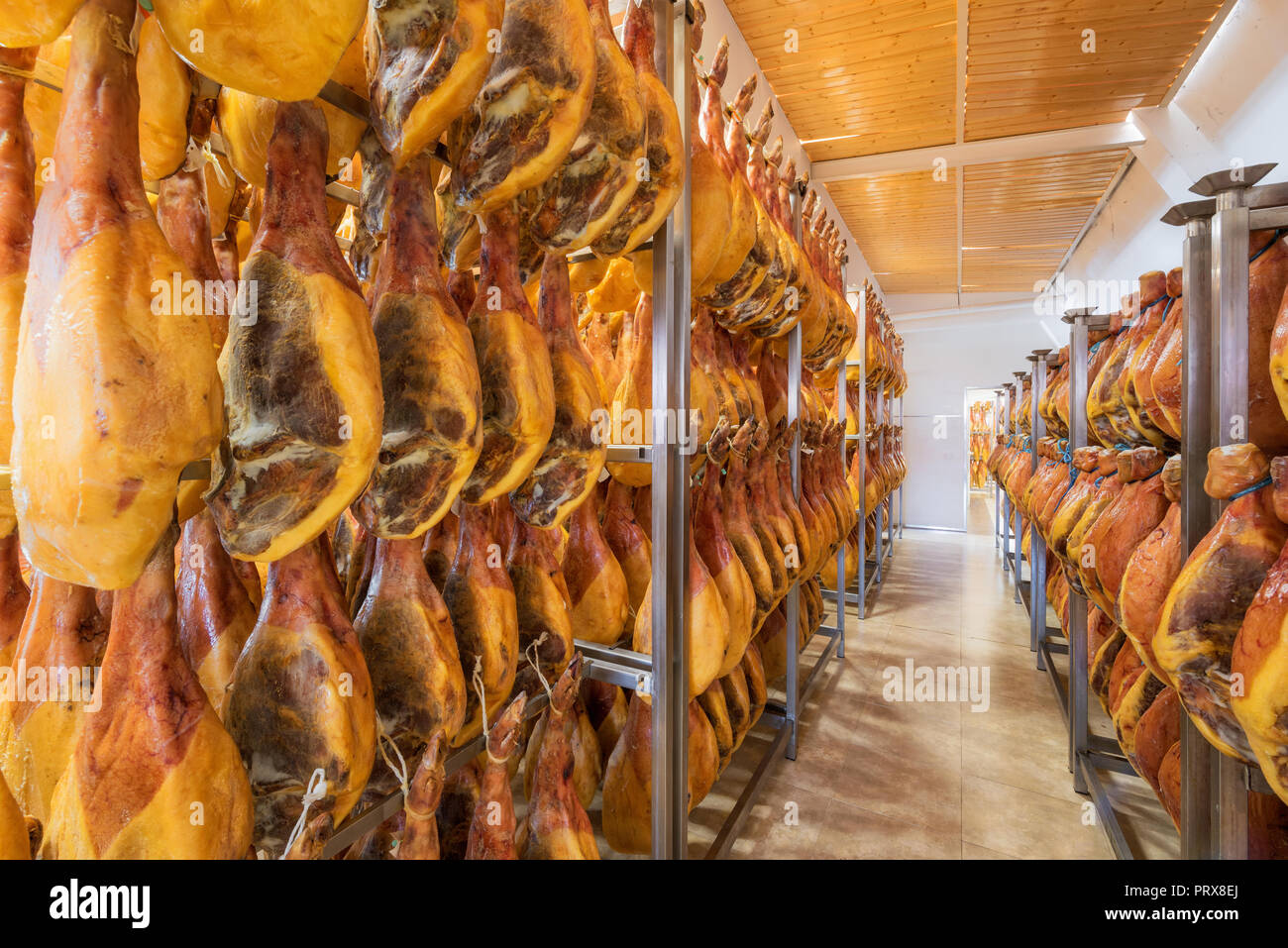 Spanish ham cellar. Food industry Stock Photo - Alamy