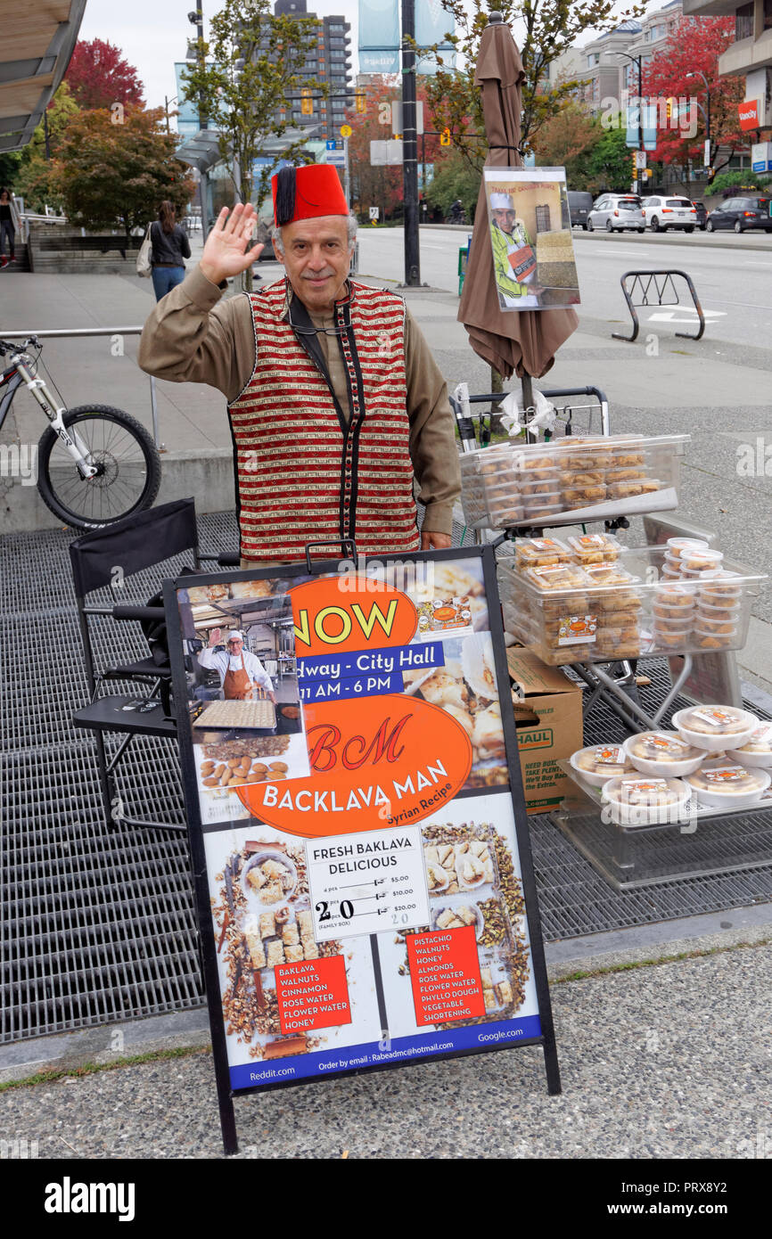 Elderly Syrian refugee man selling homemade baklava in Vancouver, BC ...