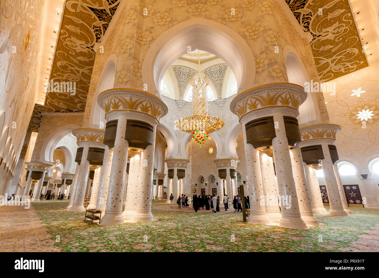 A tour group walking through the main prayer hall in the Sheikh Zayed ...