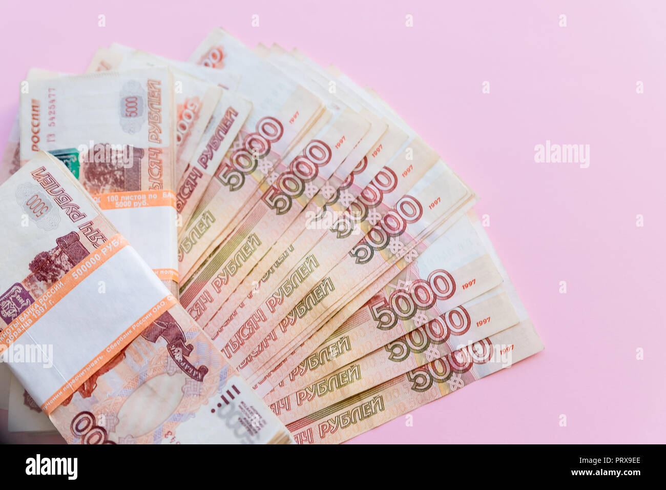 The pack of five thousandth ruble notes in half a million Russian ...