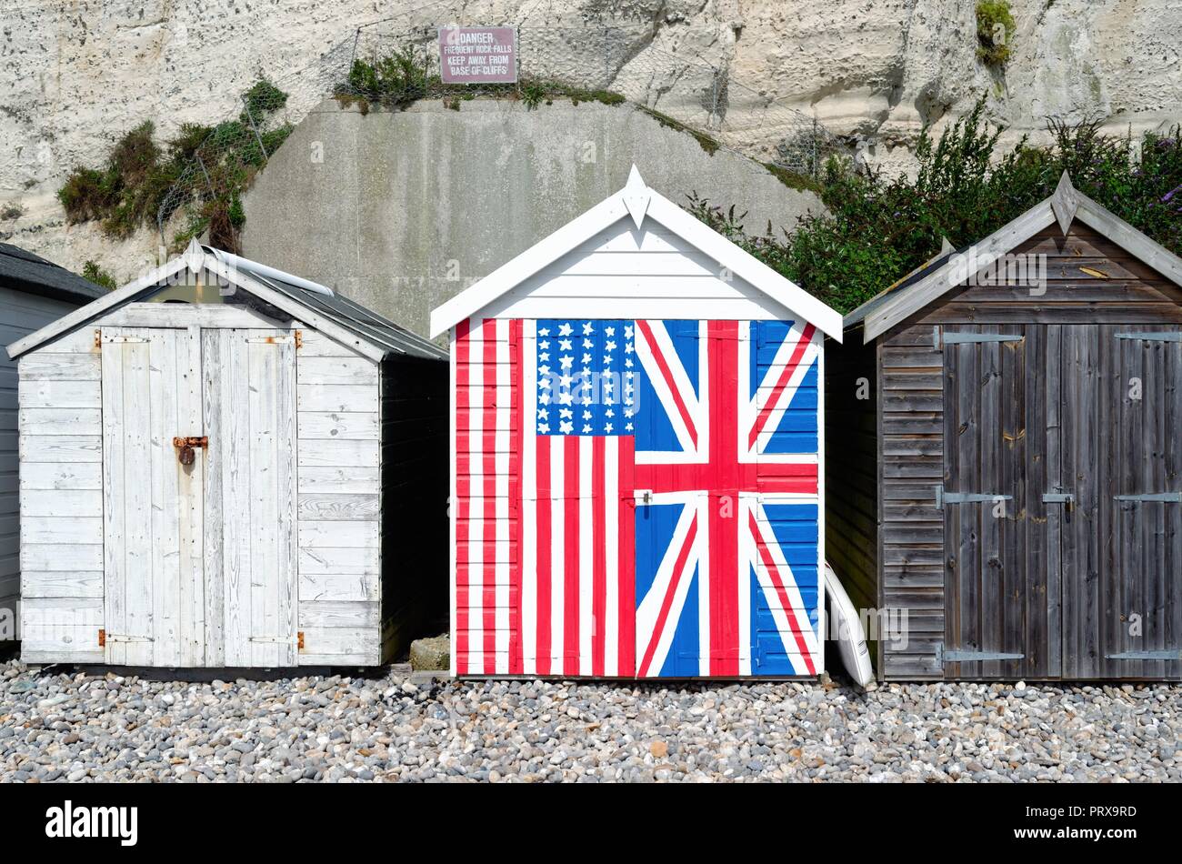 Beach hut hand painted in the flags of the United Kingdom and United ...