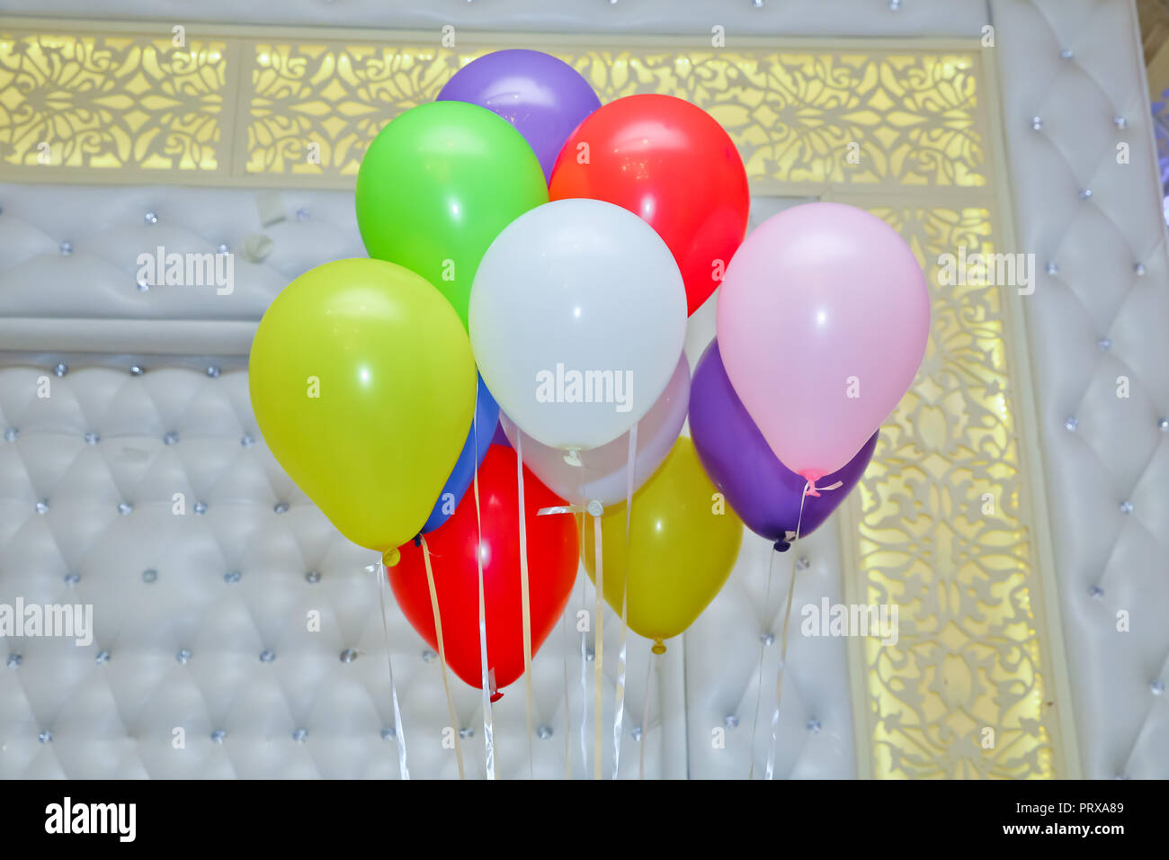 Colorful bunch of Easter egg balloons on bright white background ...