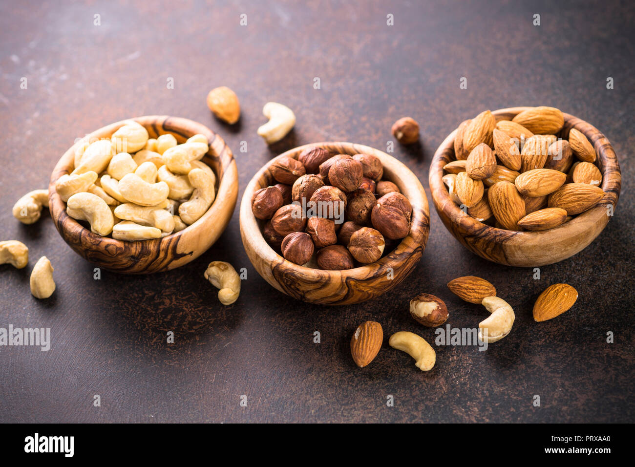 Nuts assortment in a bowls Stock Photo - Alamy