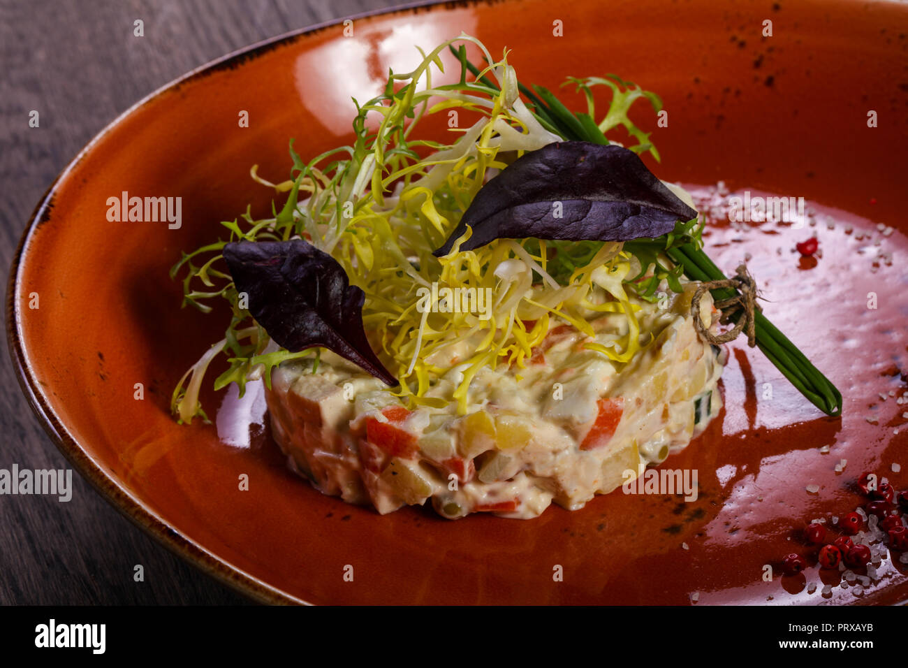 Traditional Russian salad with mayonaise Stock Photo - Alamy
