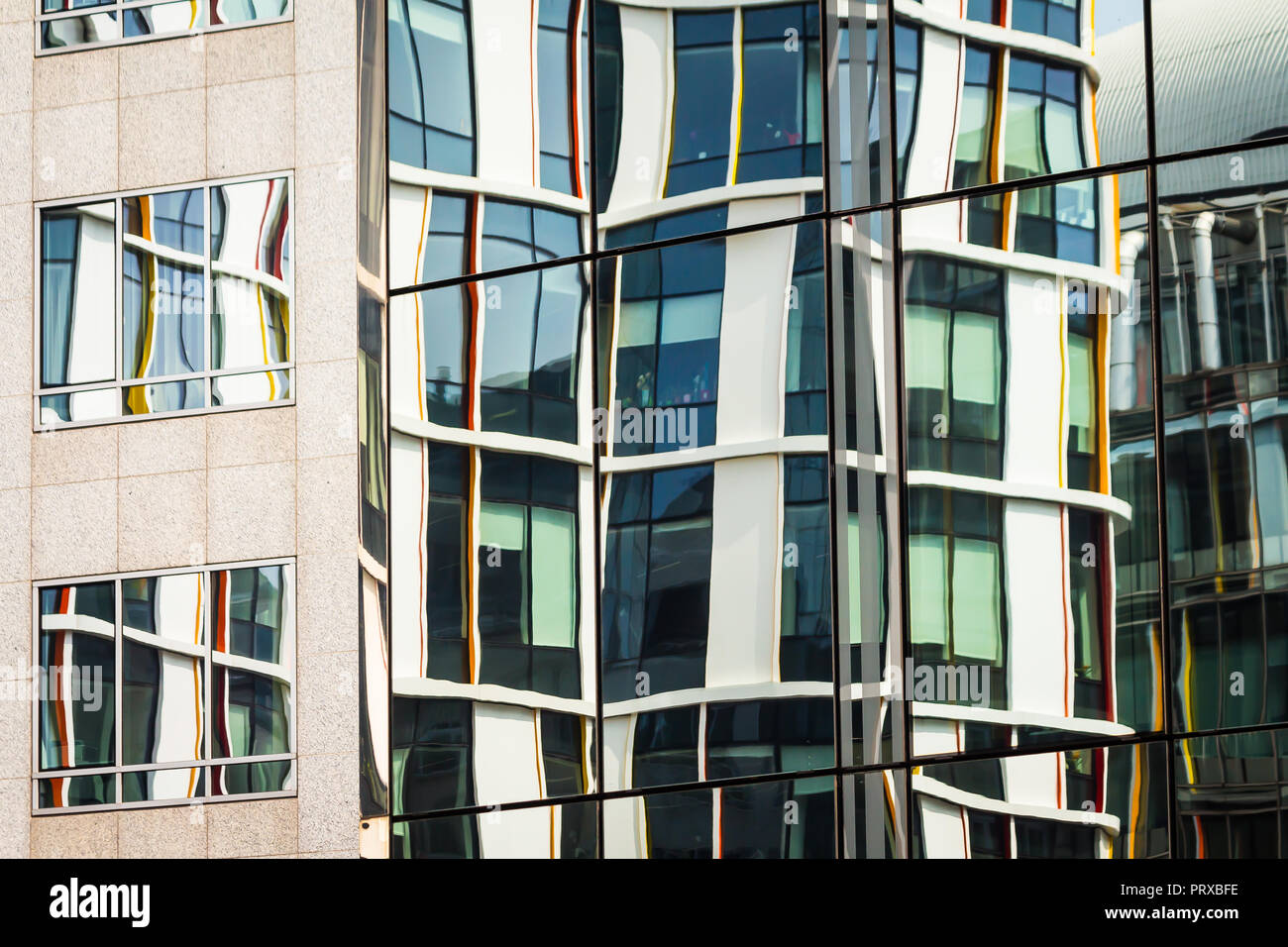 Brussels. Belgium - May 14, 2018 - Surrounding buildings reflect in the ...