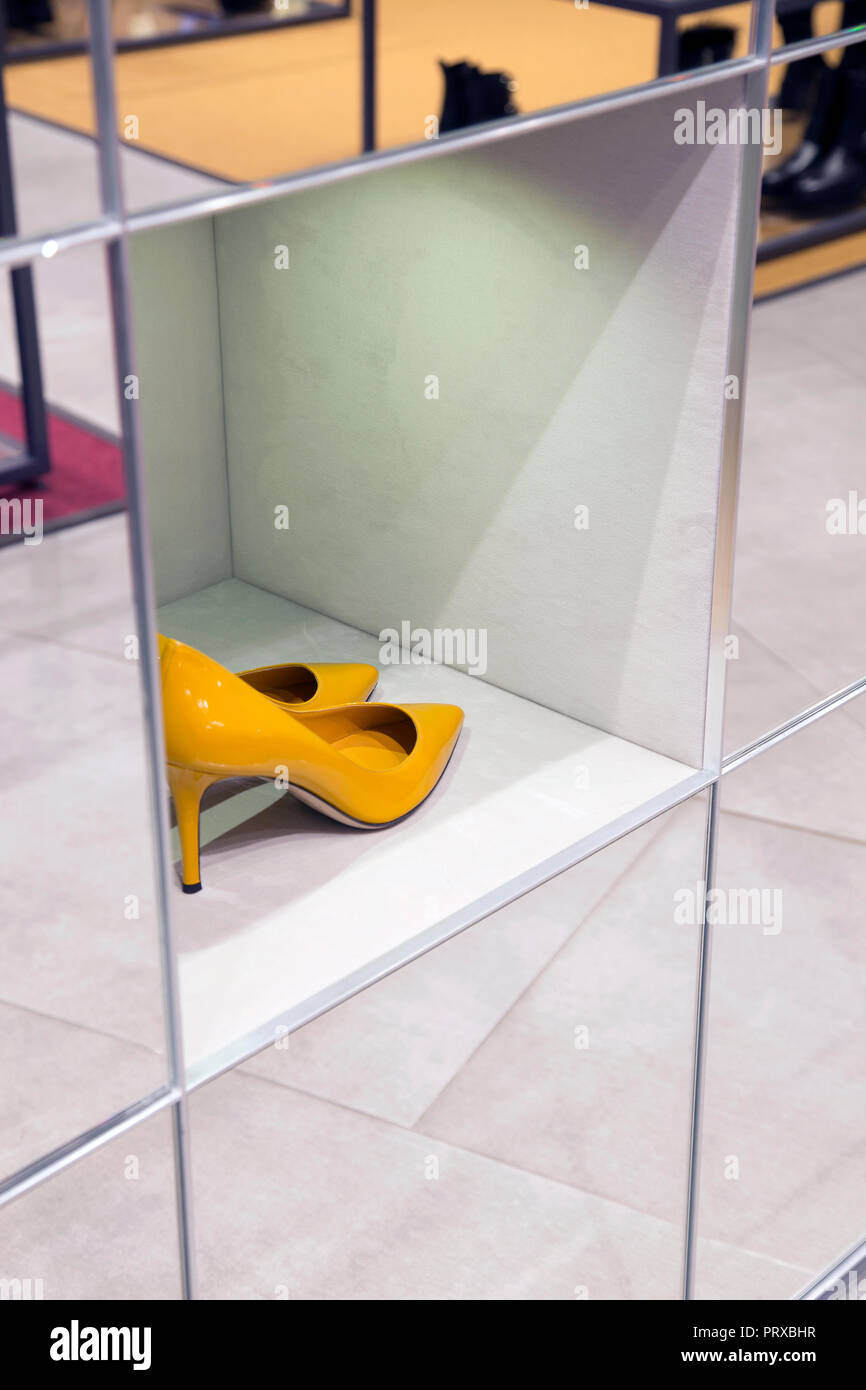 Feminine shoes in a display of a luxury store for women Stock Photo - Alamy