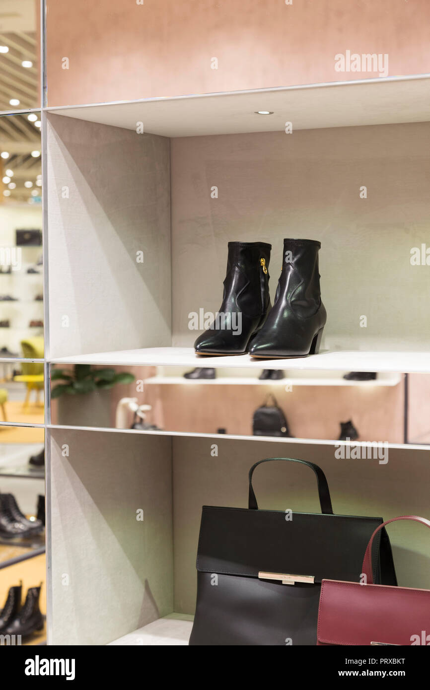 Feminine shoes in a display of a luxury store for women Stock Photo - Alamy