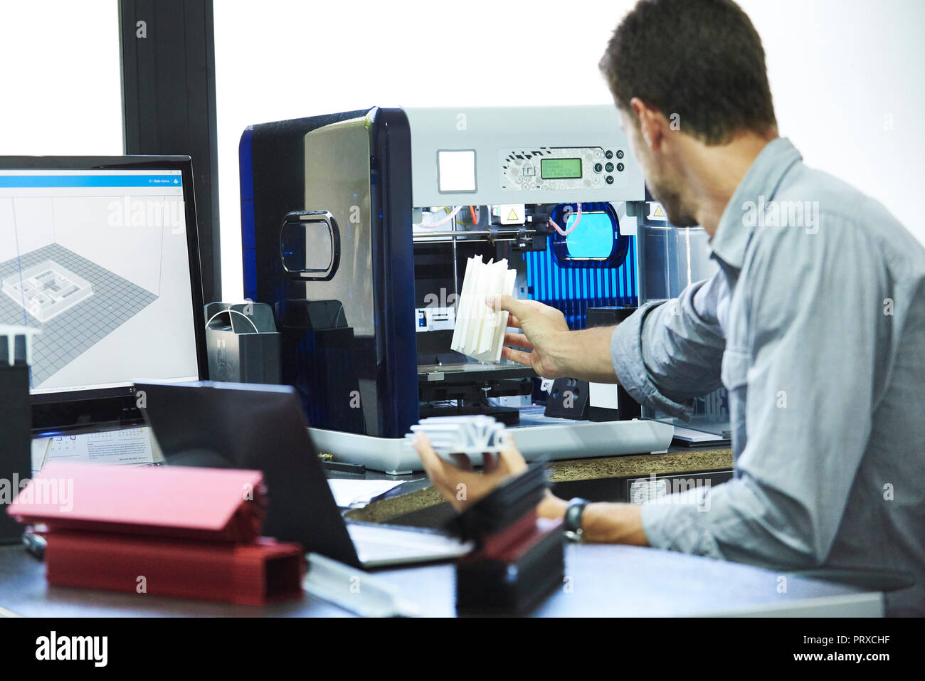 Engineer working in office Stock Photo - Alamy