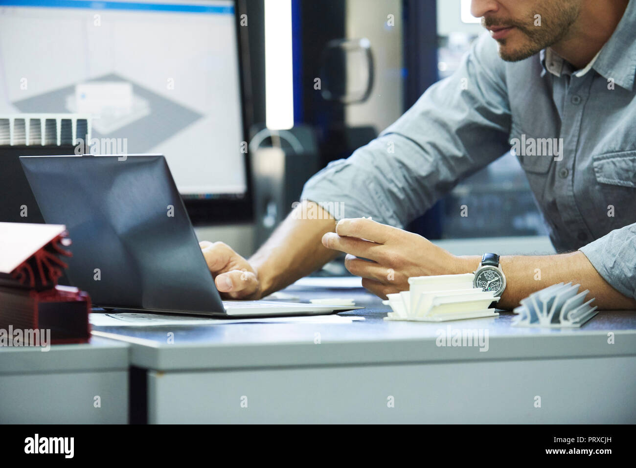 Engineer using laptop hi-res stock photography and images - Alamy