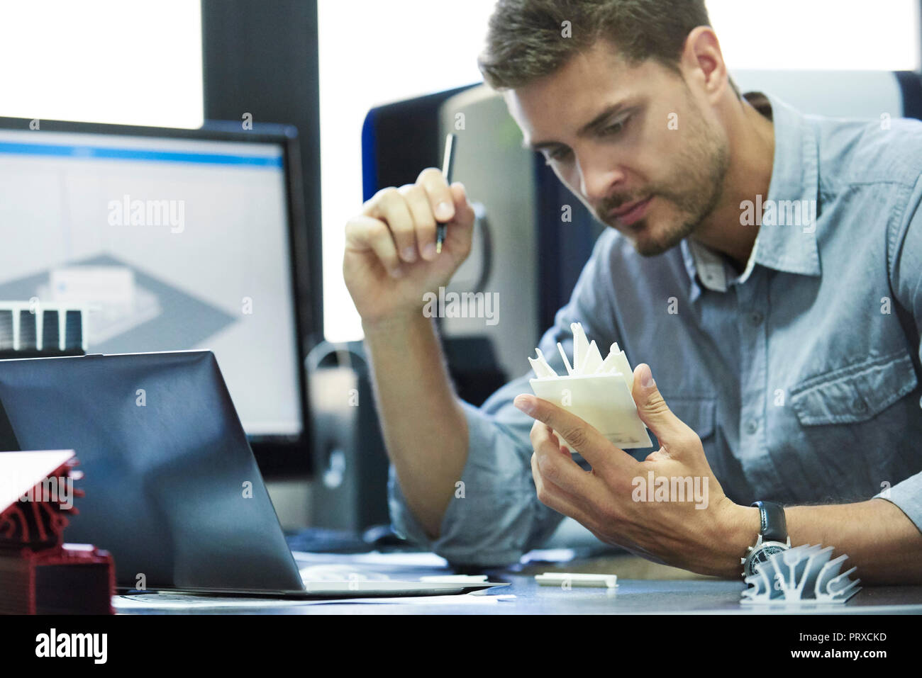 Engineer working in office Stock Photo - Alamy